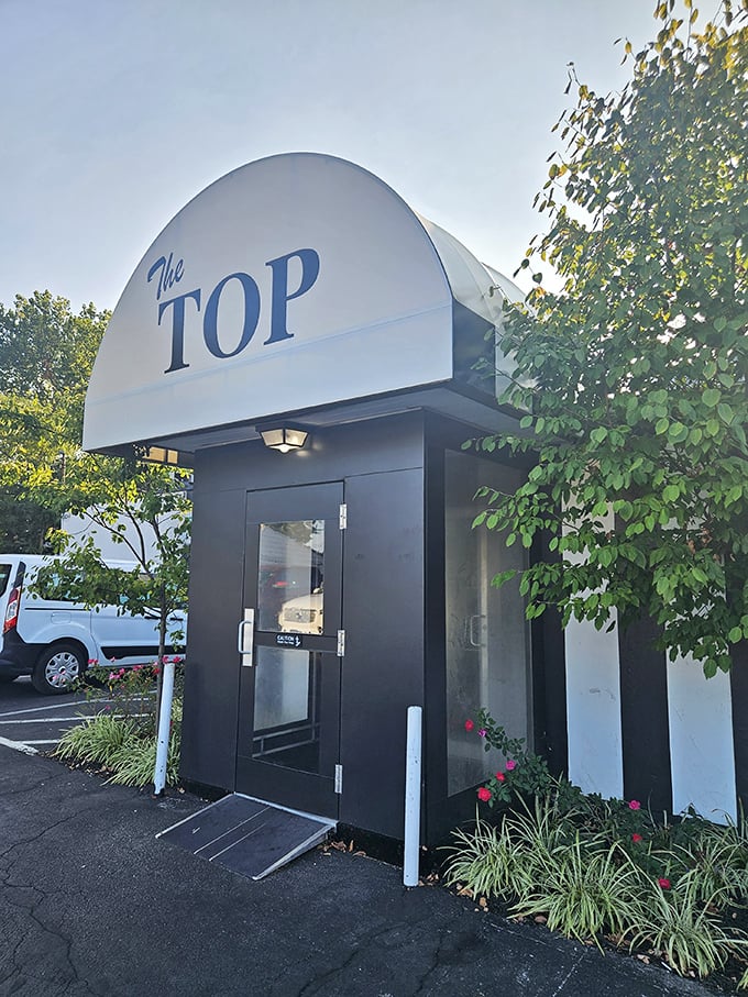 "Beam me up, Scotch fillet! The Top's retro sign promises a steakhouse experience that's out of this world."