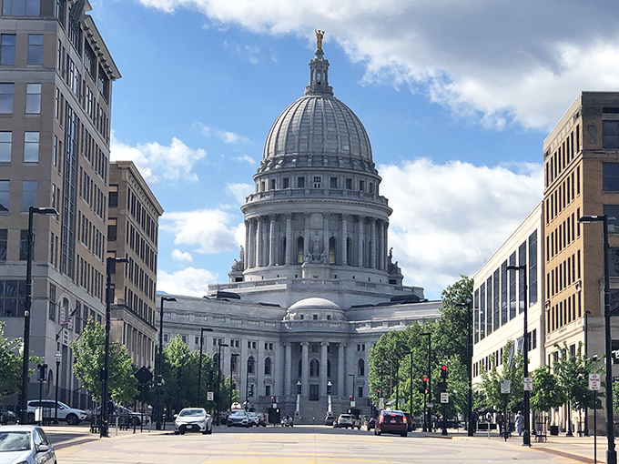 Democracy never looked so good. The Capitol's gleaming dome dominates Madison's skyline like a beacon of civic pride.