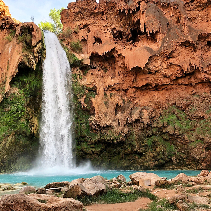 A waterfall straight out of fantasy. Indiana Jones would approve of this hidden treasure.