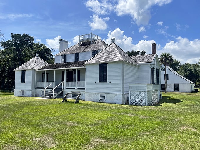 White columns stand tall, telling tales both grand and grim. A complex chapter of Florida's past awaits.