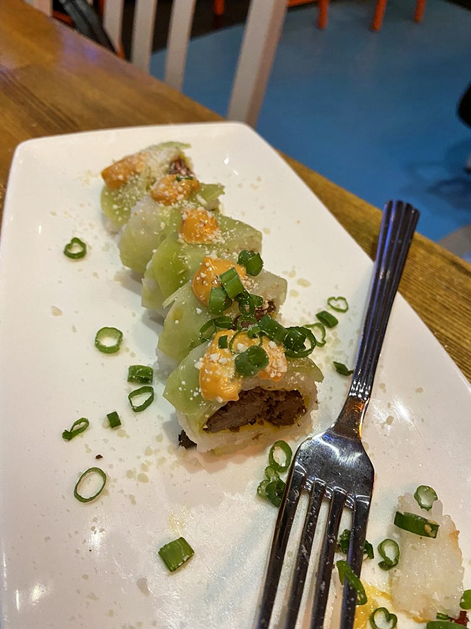 Is it sushi? Is it a burger? It's both! This culinary Frankenstein's monster is a delicious testament to thinking outside the bento box.