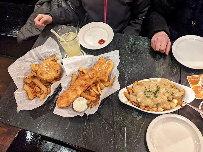 A feast fit for a king&hellip; or anyone with taste buds! Fish, chips, and poutine - it's like the United Nations of comfort food.