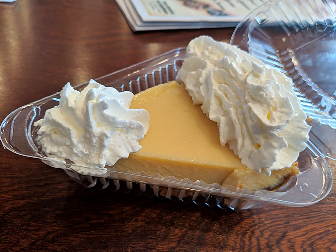 A slice of sunshine on a plate! This key lime pie looks so good, it might just make you forget about your beach body goals.