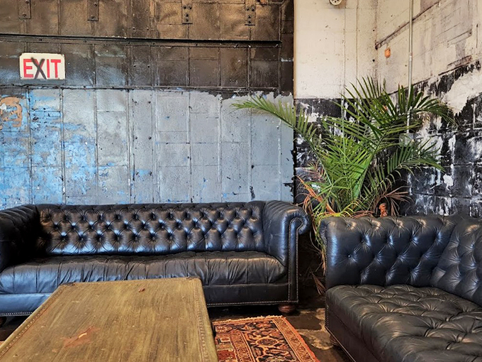 Exit through the gift shop? More like enter through the time machine. These vintage couches have seen more action than a soap opera marathon.