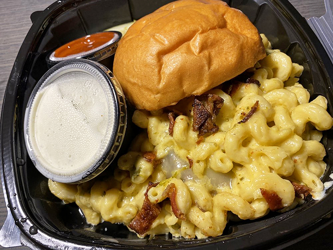 Behold, the mac daddy of all burgers! This cheesy masterpiece is what happens when your inner child becomes a gourmet chef.