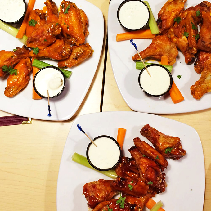 A trifecta of wing perfection! Mild, hot, or maple-glazed &ndash; it's like a flavor rainbow landed on your plate.