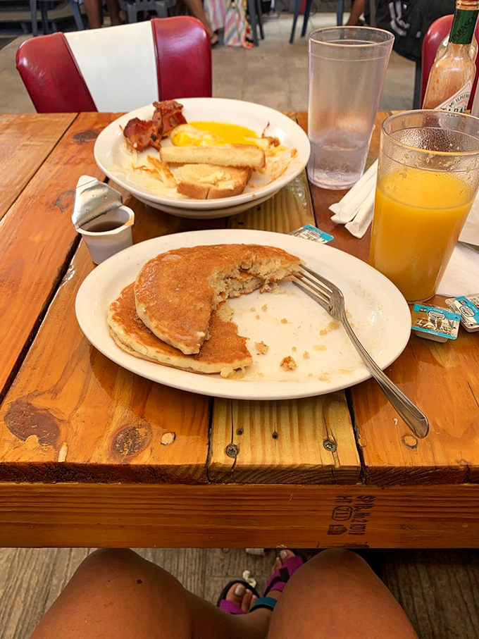 Pancakes so fluffy, they could double as pillows. Paired with that crispy bacon, it's like a breakfast lullaby for your taste buds.