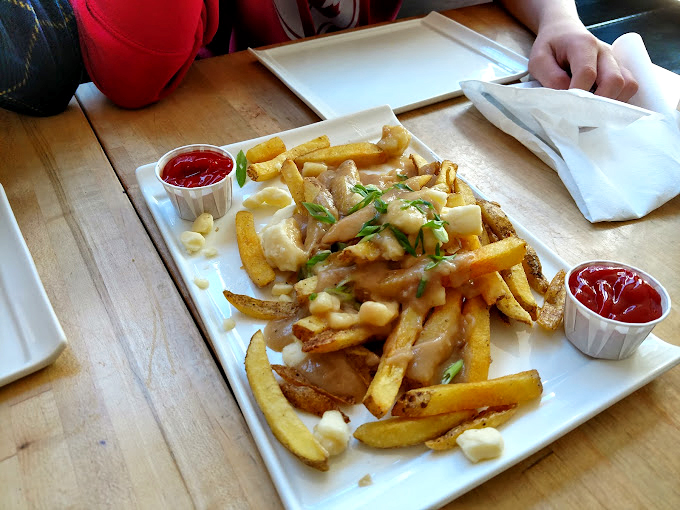 Sharing is caring, especially when it comes to Nosh's poutine. It's the ultimate friendship test &ndash; can you resist hogging all the cheesy, gravy-soaked goodness?