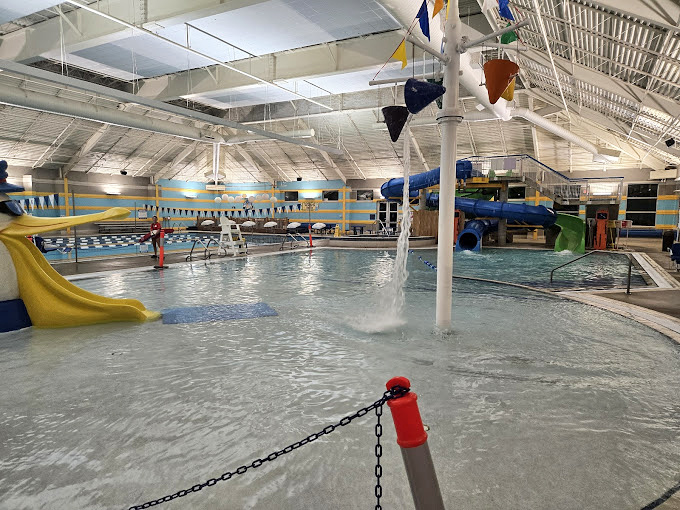 Splash zone shenanigans! The indoor pool area is a hive of activity, where Marco Polo reigns supreme and cannonballs are an art form.