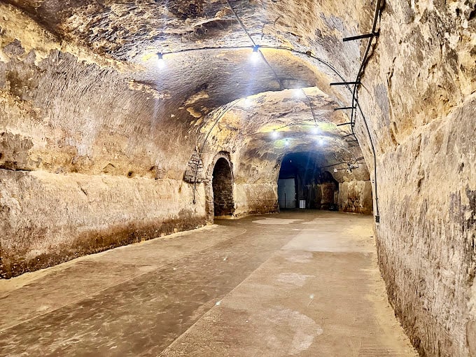 Illuminating the past! These well-lit tunnels once echoed with jazz and whispered conspiracies. Now they're ready for your own clandestine adventure.