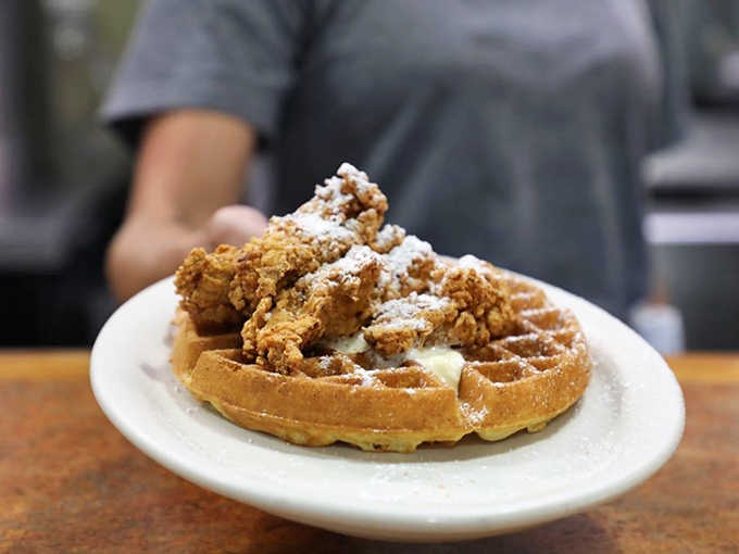 The ultimate Southern power couple: chicken and waffles. It's like breakfast and dinner had a delicious baby, and we're all invited to the christening.