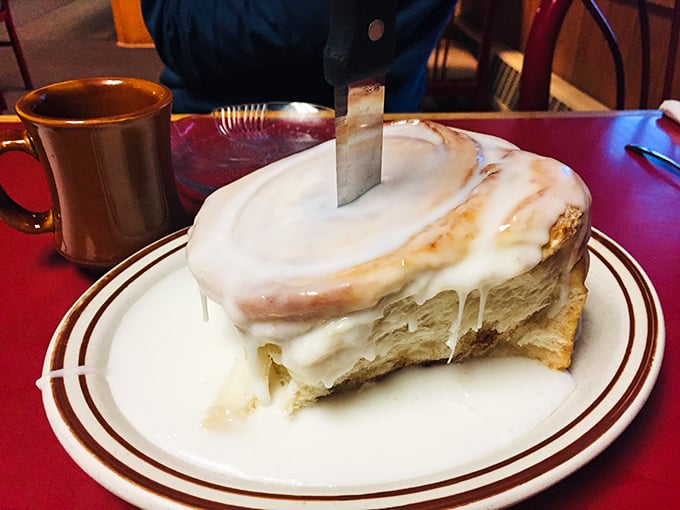 The dynamic duo of morning happiness: a sweetroll that could feed a small army and coffee strong enough to wake the dead. Breakfast of champions, indeed!