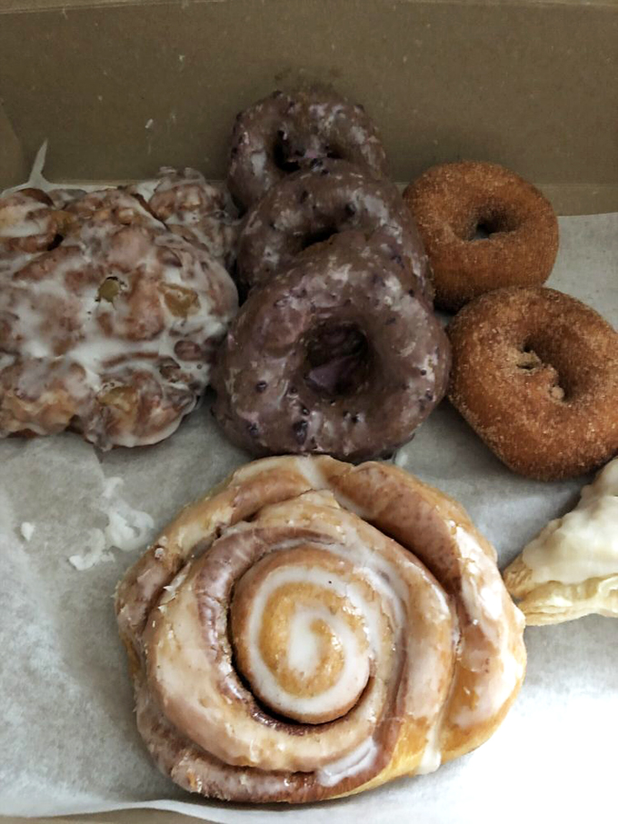 A box of joy! This assortment of donuts and rolls is like a greatest hits album for your taste buds.