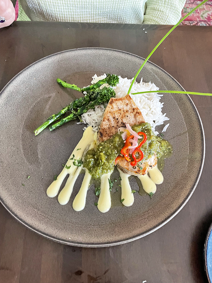 Surf meets turf in a dance of deliciousness. This halibut dish is so pretty, it could moonlight as modern art.