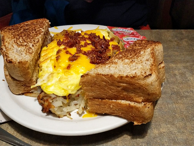 Cheese lovers, rejoice! This omelet is the stuff of dairy dreams, paired with a crispy hash brown sidekick.