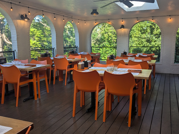 Dine al fresco in style! This covered patio offers a front-row seat to nature's show while you savor smoky goodness. 