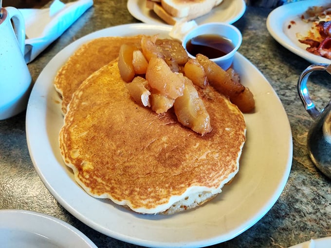 Pancake perfection! These golden discs, topped with cinnamon-kissed apples, are what breakfast dreams are made of. Sorry, diet – you're sitting this one out.