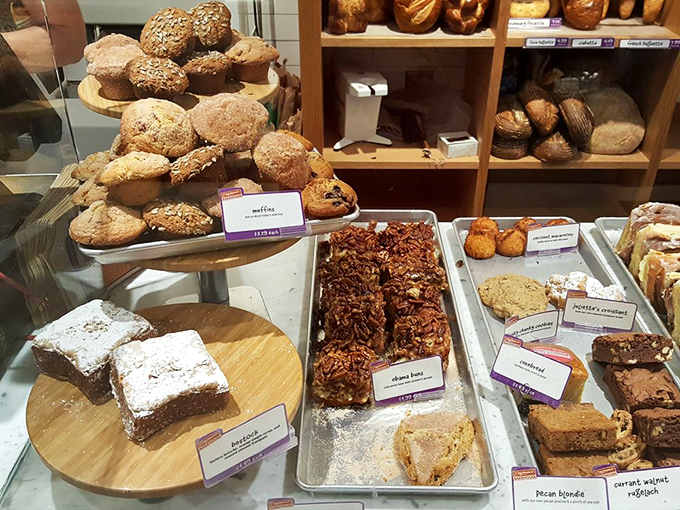 A feast for the eyes and the taste buds! These pastries are so beautifully arranged, it's like the Great British Bake Off finale in display case form.