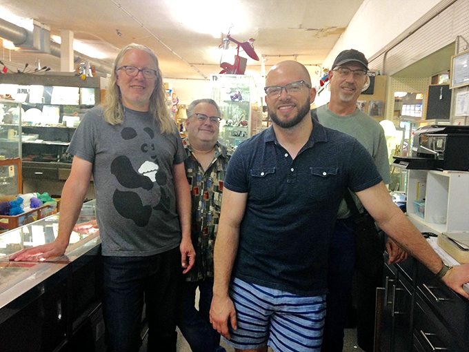 These friendly faces are the guardians of nostalgia, ready to help you find that perfect piece of the past. They're like Indiana Jones, but with better customer service skills!