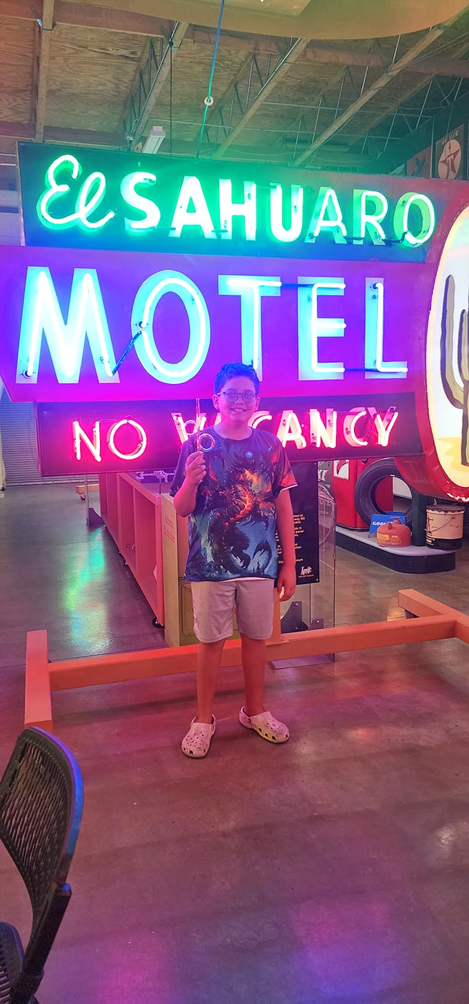 "No Vacancy" for boredom here! This young explorer is clearly ready to check in to a world of illuminated wonder.