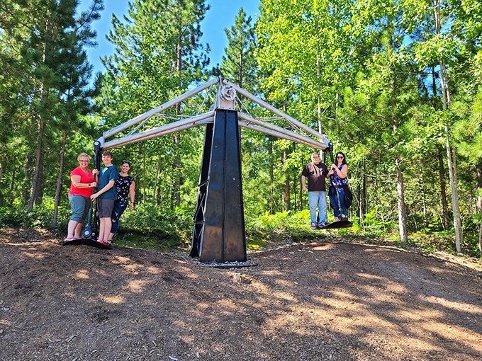Step right up to the world's most unusual seesaw! It's like playground equipment designed by a steampunk enthusiast with a flair for the dramatic.