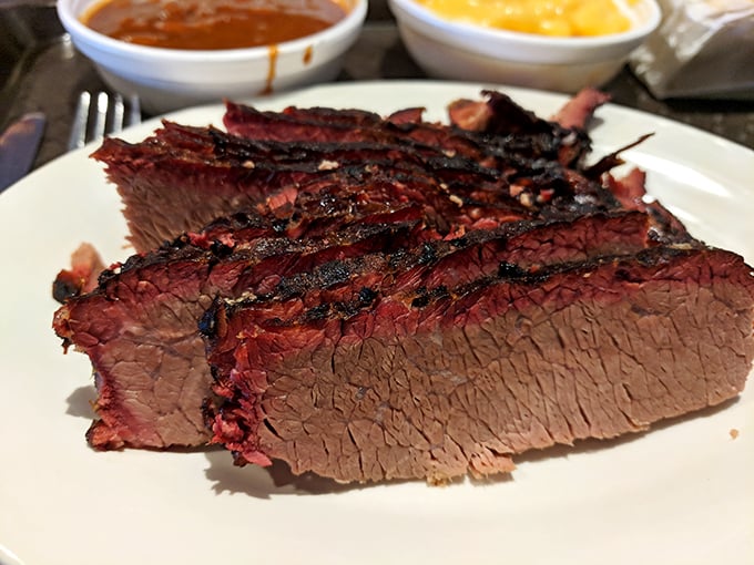 Behold the brisket, in all its smoky glory! Each slice is a testament to patience, skill, and the magic of low-and-slow cooking. It's meat candy for grown-ups.