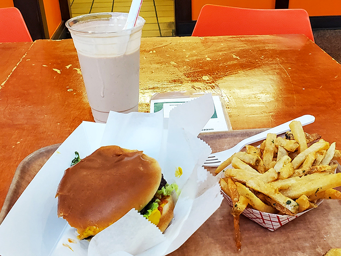 The holy trinity of comfort food: a juicy burger, crispy fries, and a shake thick enough to stand a spoon in. Diet? What diet?