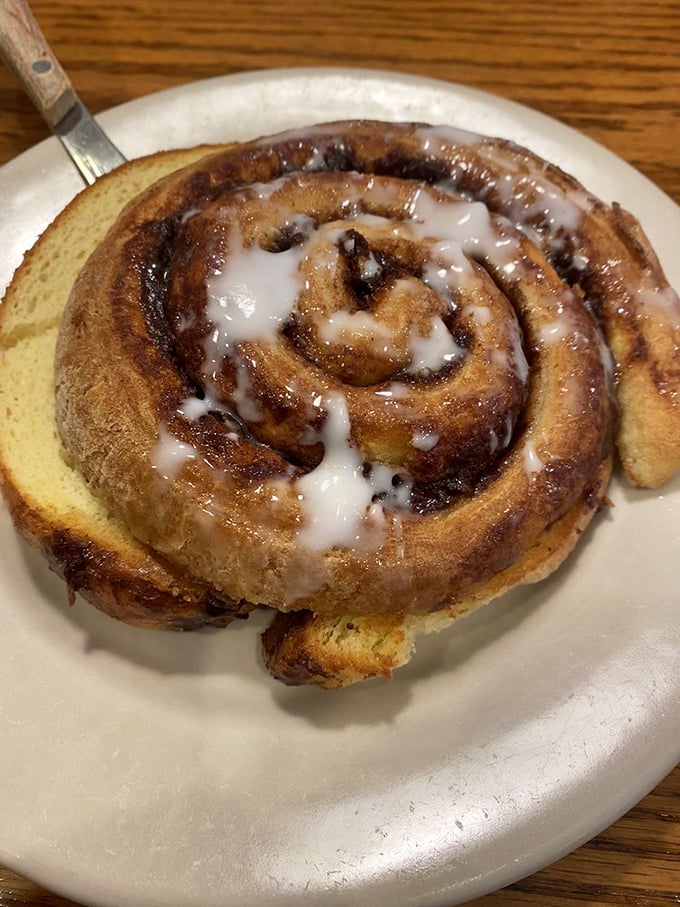Cinnamon roll or edible work of art? This spiral of sweetness is begging to be unraveled and devoured, one gooey layer at a time.