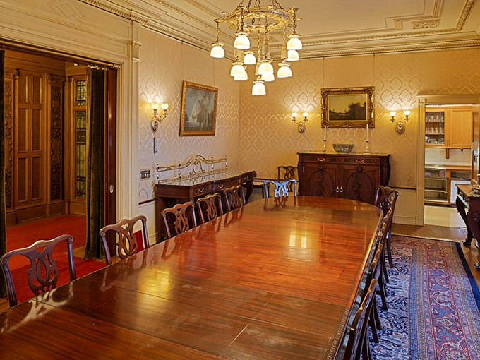 Dinner is served! This dining room could host a feast fit for royalty or a lively game of Clue.