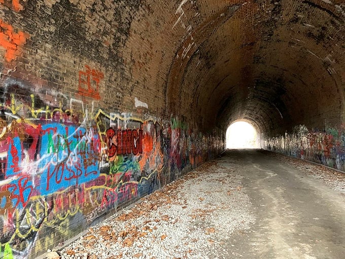 Where street art meets subterranean canvas: The tunnel's walls showcase a vibrant, ever-changing gallery of local expression.