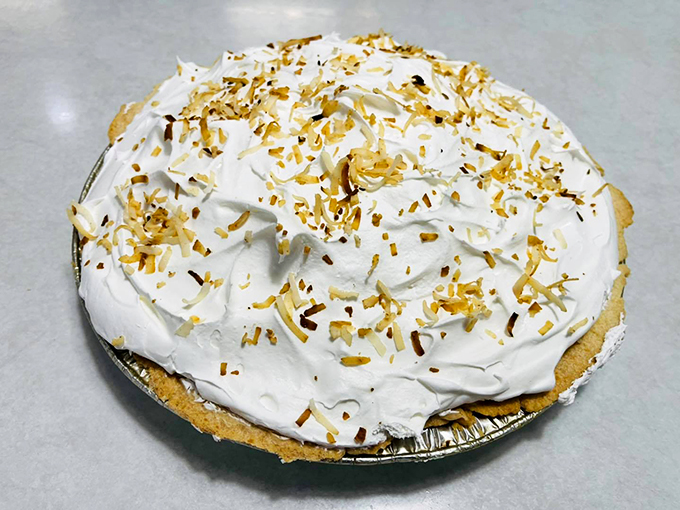 Cloud nine? Nah, this is cloud pie! Fluffy, creamy, and topped with toasted coconut – it's like a tropical vacation for your mouth.