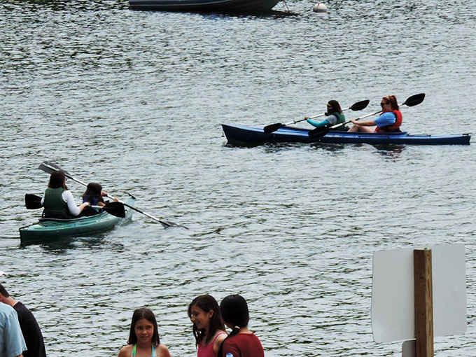 Paddle your way to serenity! These kayakers are getting their daily dose of vitamin 'lake' - doctor's orders!