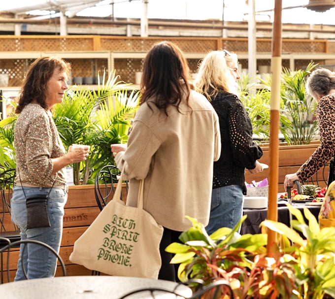 Ladies who lunch... and learn! These green-thumbed gals are soaking up knowledge faster than their plants soak up water. Talk about growth potential!