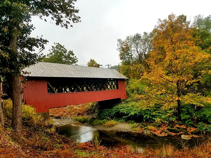 Fall in Vermont: where the trees put on a show that rivals Broadway. This bridge? It's the star of the production!