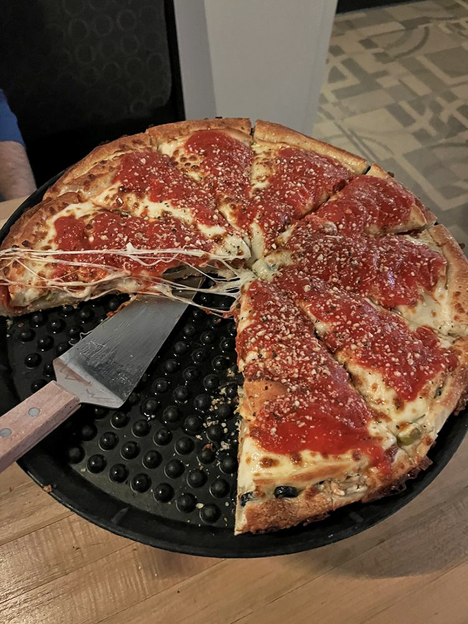 Chicago stuffed pizza: where "a slice" is a full meal and "I'm full" is a challenge. This cheese-laden behemoth is the Godzilla of pizzas, here to conquer your hunger and your heart.