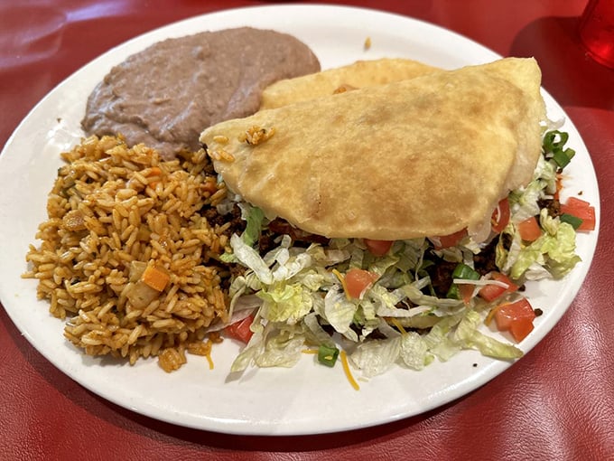 Behold, the Southwest's answer to the calzone! This stuffed sopapilla is what happens when comfort food gets a spicy makeover.
