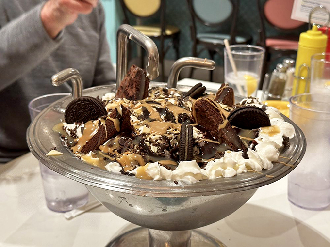 Holy cow! This sundae's got more layers than a Shakespeare play. Grab a spoon and dive into this delicious drama &ndash; no soliloquy required.