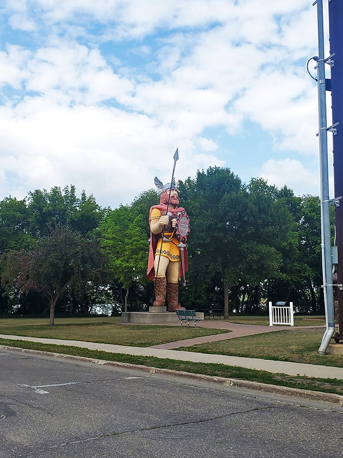 Big Ole's got a million-dollar view. With that lake behind him, he's probably wishing he'd brought a fishing rod instead of a spear.
