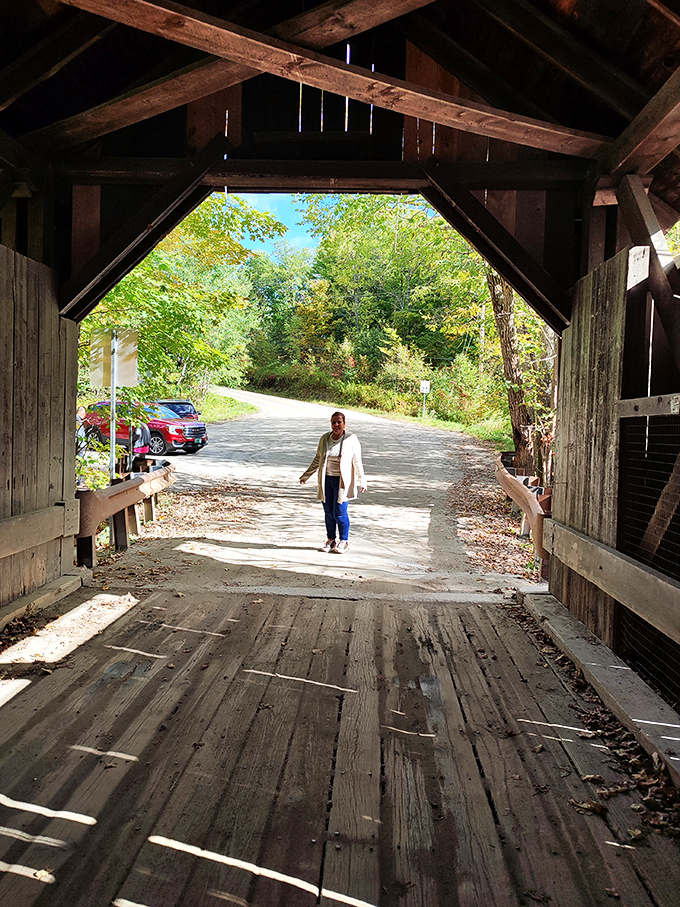 Bridge meets world! Visitors young and old cross paths with history, creating a living postcard of Vermont's timeless appeal.