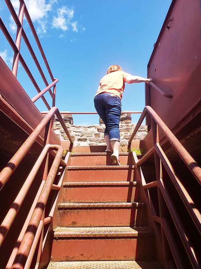 Capturing memories or hunting for revolutionary ghosts? This visitor seems ready for both at Ethan Allen Tower. Say "cheese" and "liberty"!