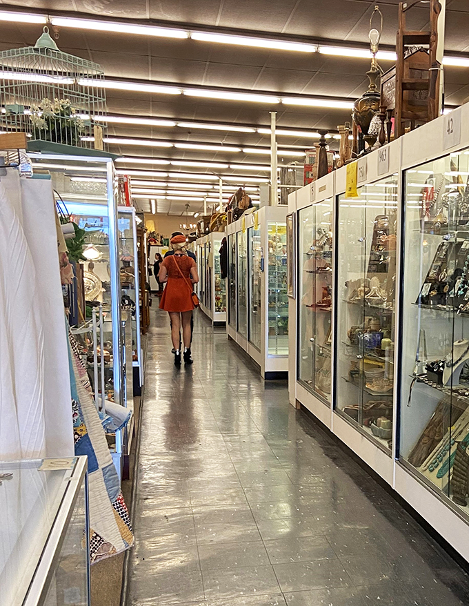 Spot the time traveler! This savvy shopper knows that the best way to predict the future is to collect the past. Orange you glad vintage is always in style?