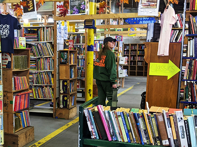 Even the staff can't resist diving into the stacks. It's like Where's Waldo, but with book lovers!