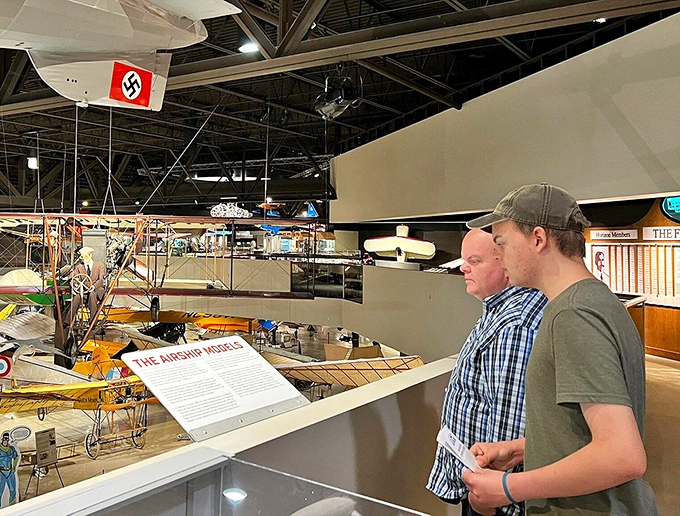 "Look, son, that's how grandpa used to fly!" Visitors young and old marvel at aviation's colorful history.