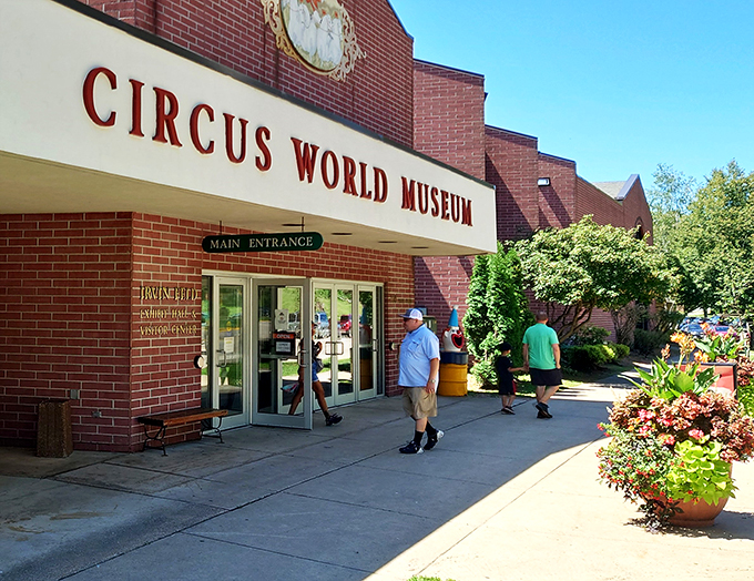 Roll up, roll up! Eager visitors flock to Circus World, ready to dive into a world of sawdust and spectacle.