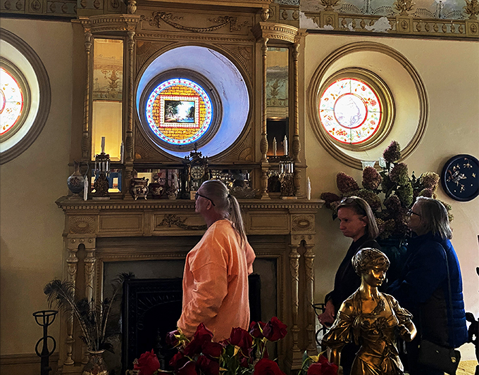 "And here we have the 'ooh' and 'aah' room." Visitors marvel at the ornate fireplace &ndash; it's like a museum piece you can actually warm your hands by!
