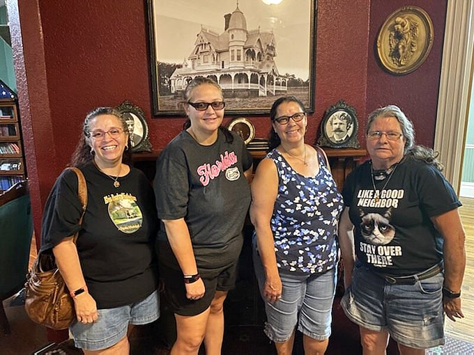 Ghost hunters or history buffs? Either way, these visitors look ready to uncover the secrets of the Donnelly House.