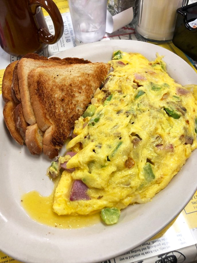 Eggs-cellent news! This Western omelet is so stuffed, it's practically the Thanksgiving turkey of breakfast foods. Yeehaw for your taste buds!