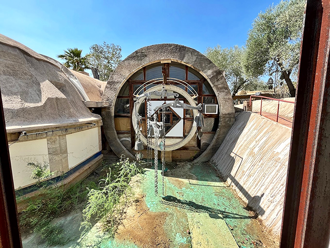 Concrete poetry in motion: Where avant-garde architecture dances with desert winds.