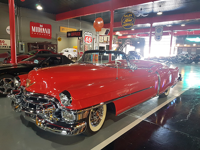 That red Cadillac isn't just a car – it's a rolling sculpture that makes you wonder if your sedan feels inadequate by comparison.