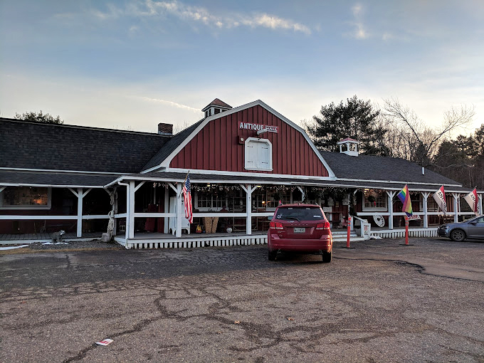 Red, white, and antique all over &ndash; this barn's got more stories than a history book.
